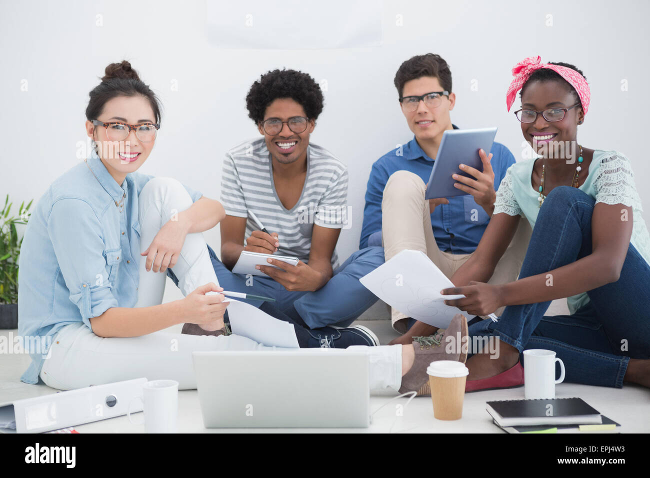 Young creative team brainstorming together Stock Photo - Alamy