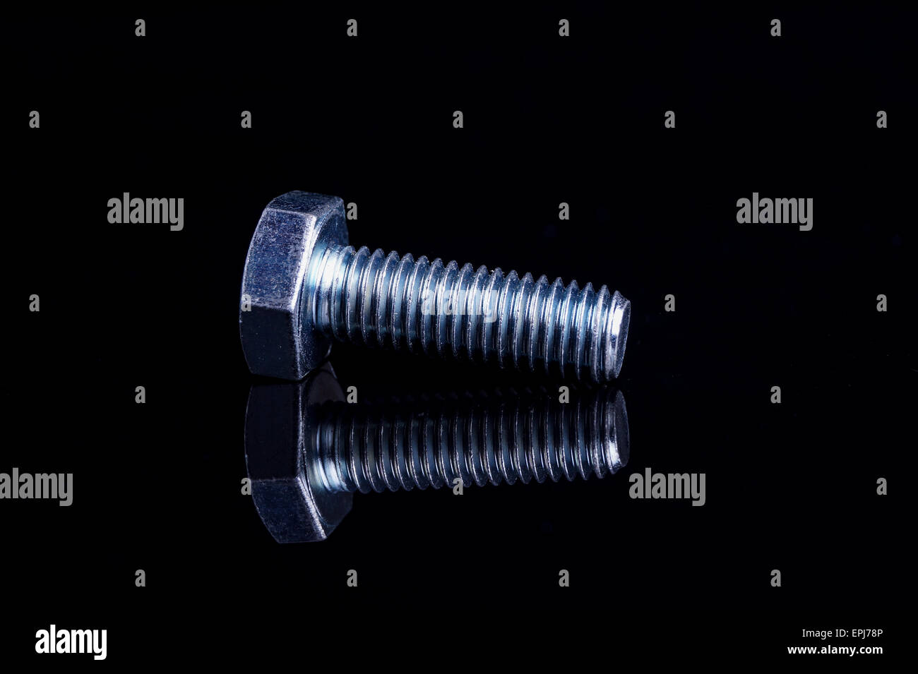 Shiny metal Bolt or screw isolated on black background Stock Photo - Alamy