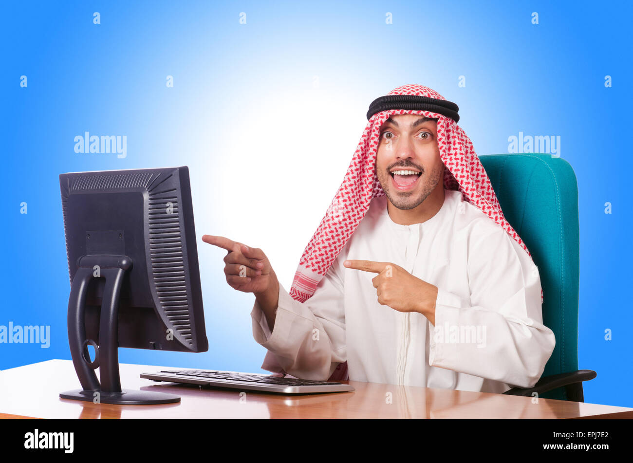 Arab businessman working on computer Stock Photo - Alamy