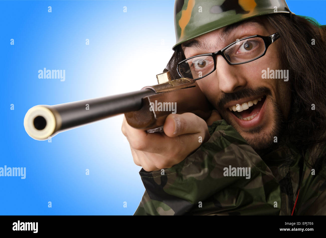 Funny soldier in humour concept Stock Photo - Alamy