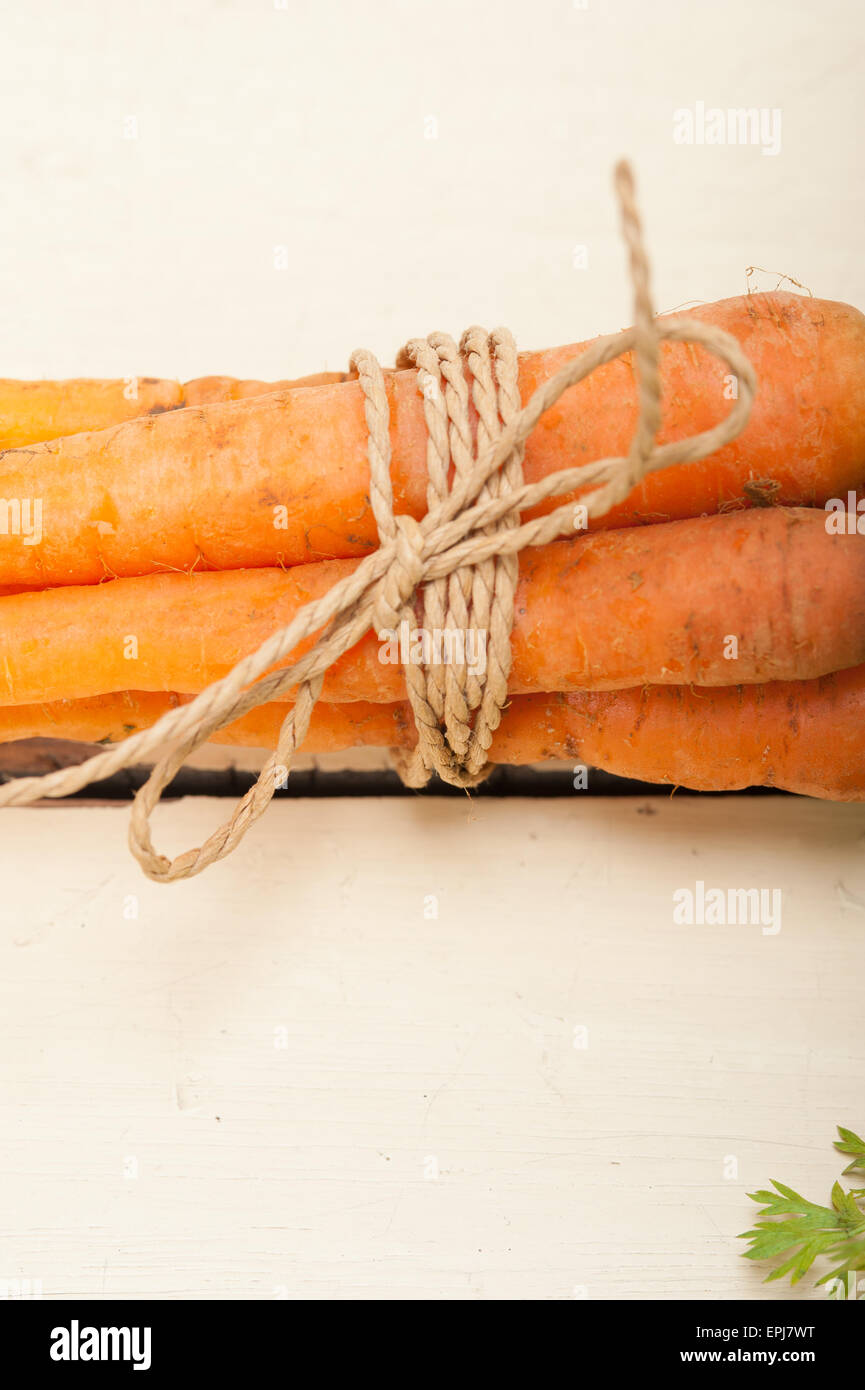 baby carrots bunch tied with rope Stock Photo - Alamy
