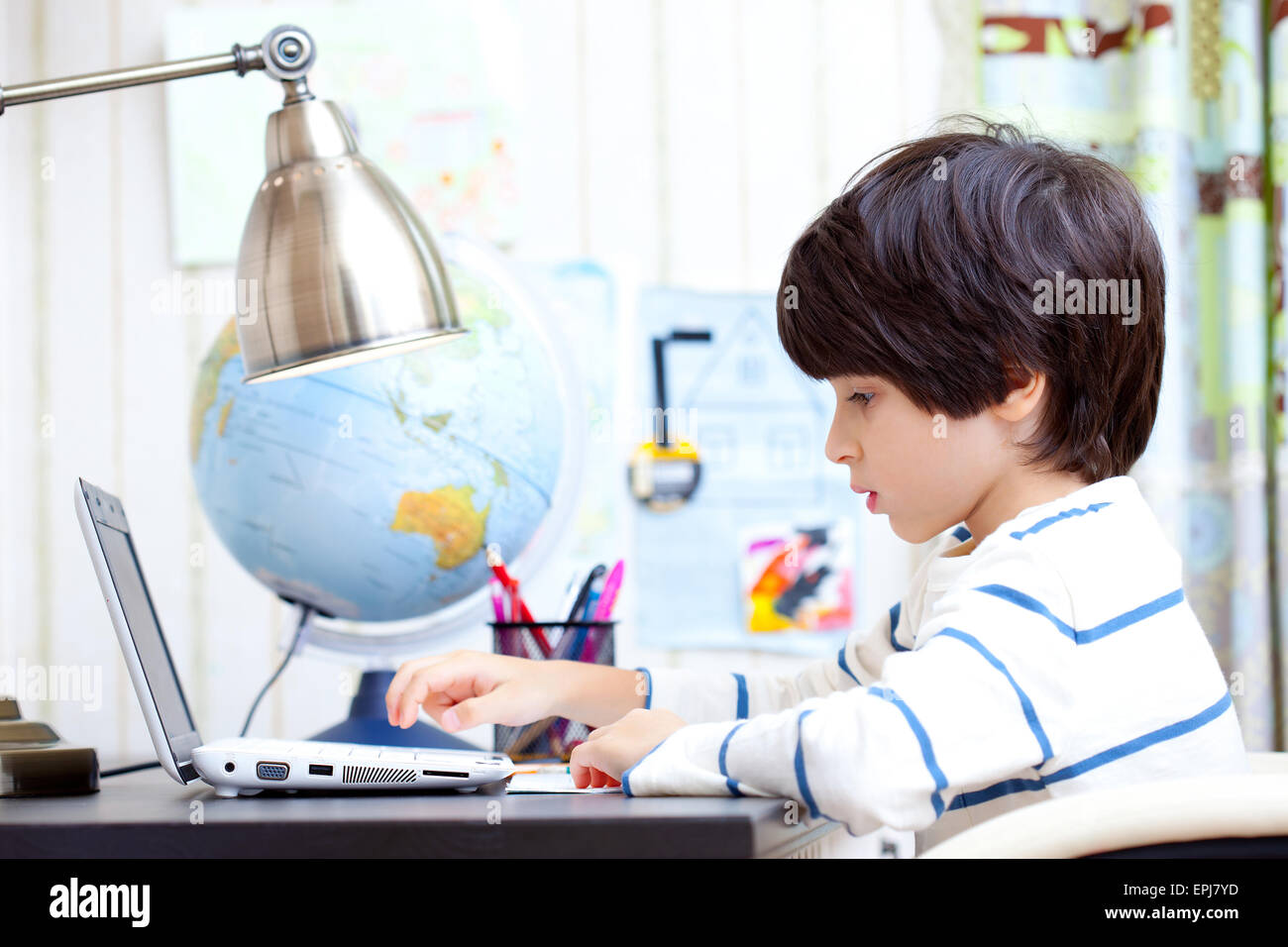 schoolchild working on a computer Stock Photo - Alamy