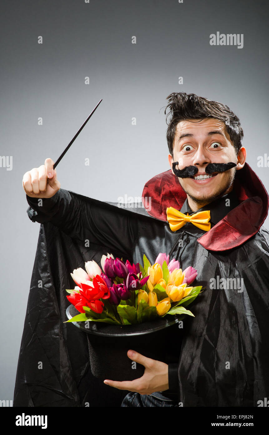 Funny magician man with wand and hat Stock Photo - Alamy