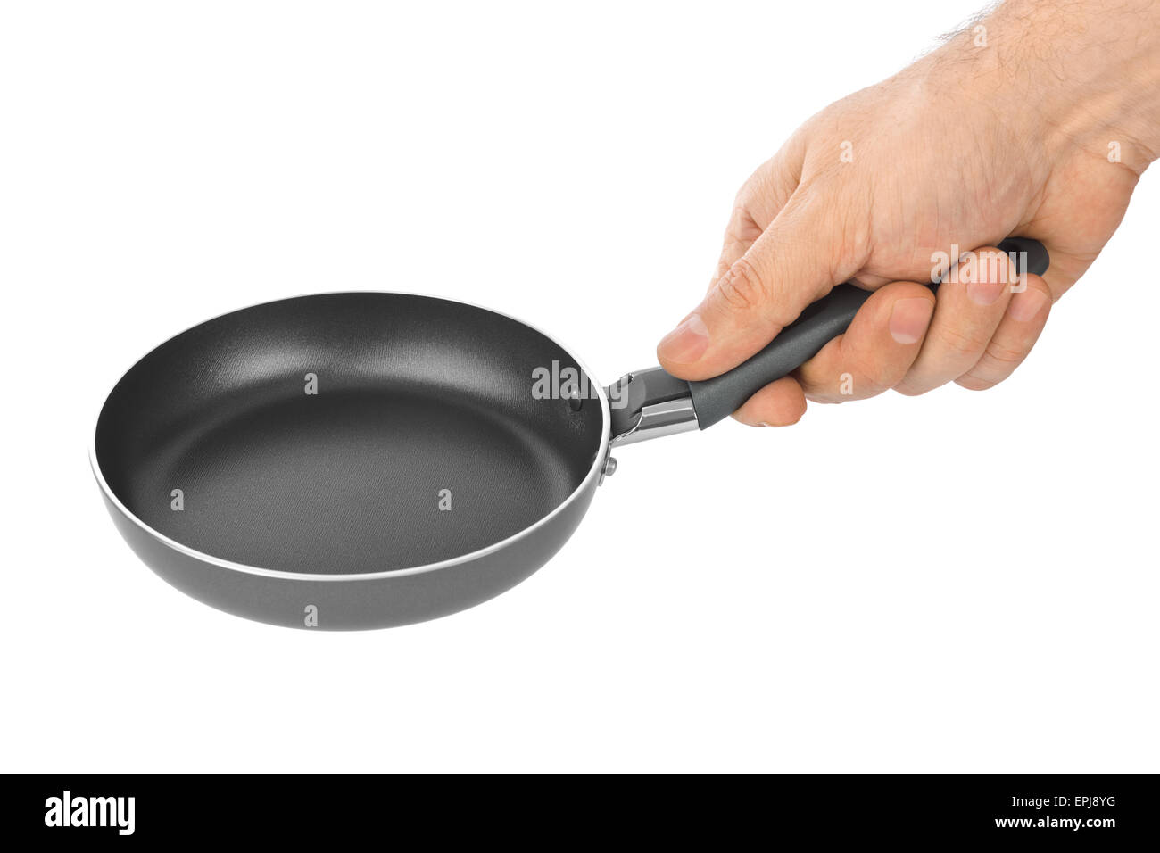 Hand with frying pan Stock Photo - Alamy