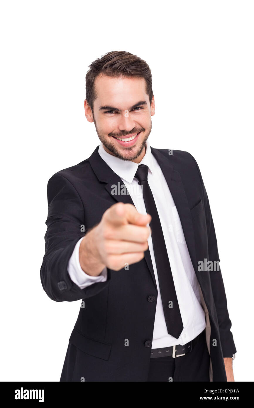 Happy businessman pointing at camera Stock Photo - Alamy