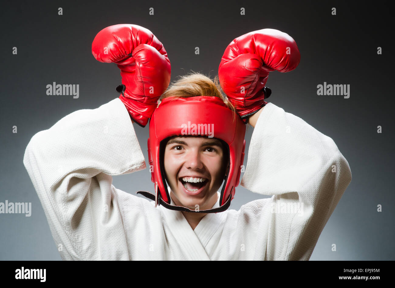 Funny boxer against dark background Stock Photo - Alamy