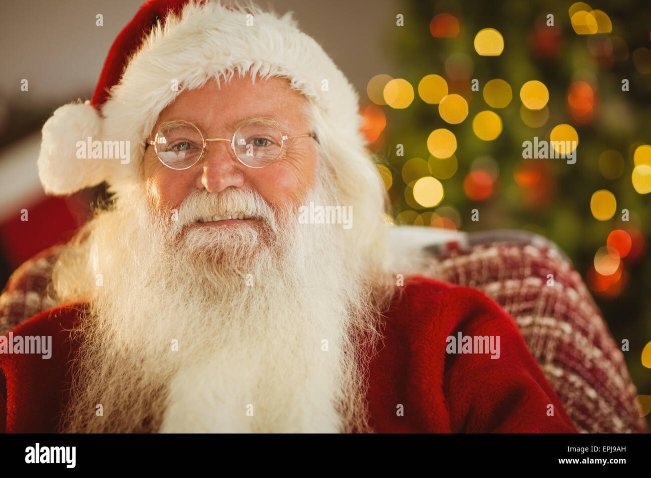 Portrait of happy santa with his glasses Stock Photo - Alamy