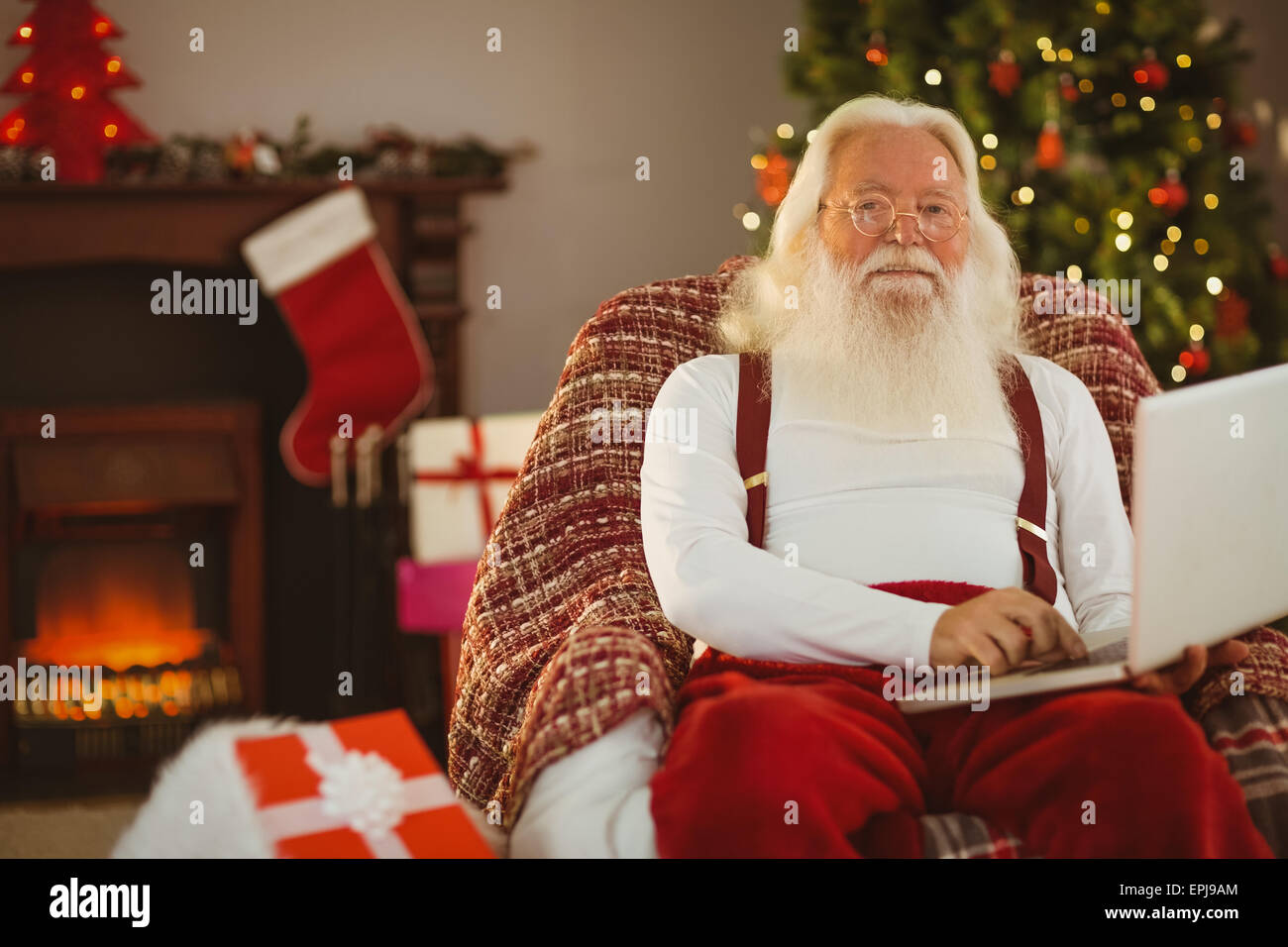 Typing santa claus hi-res stock photography and images - Alamy