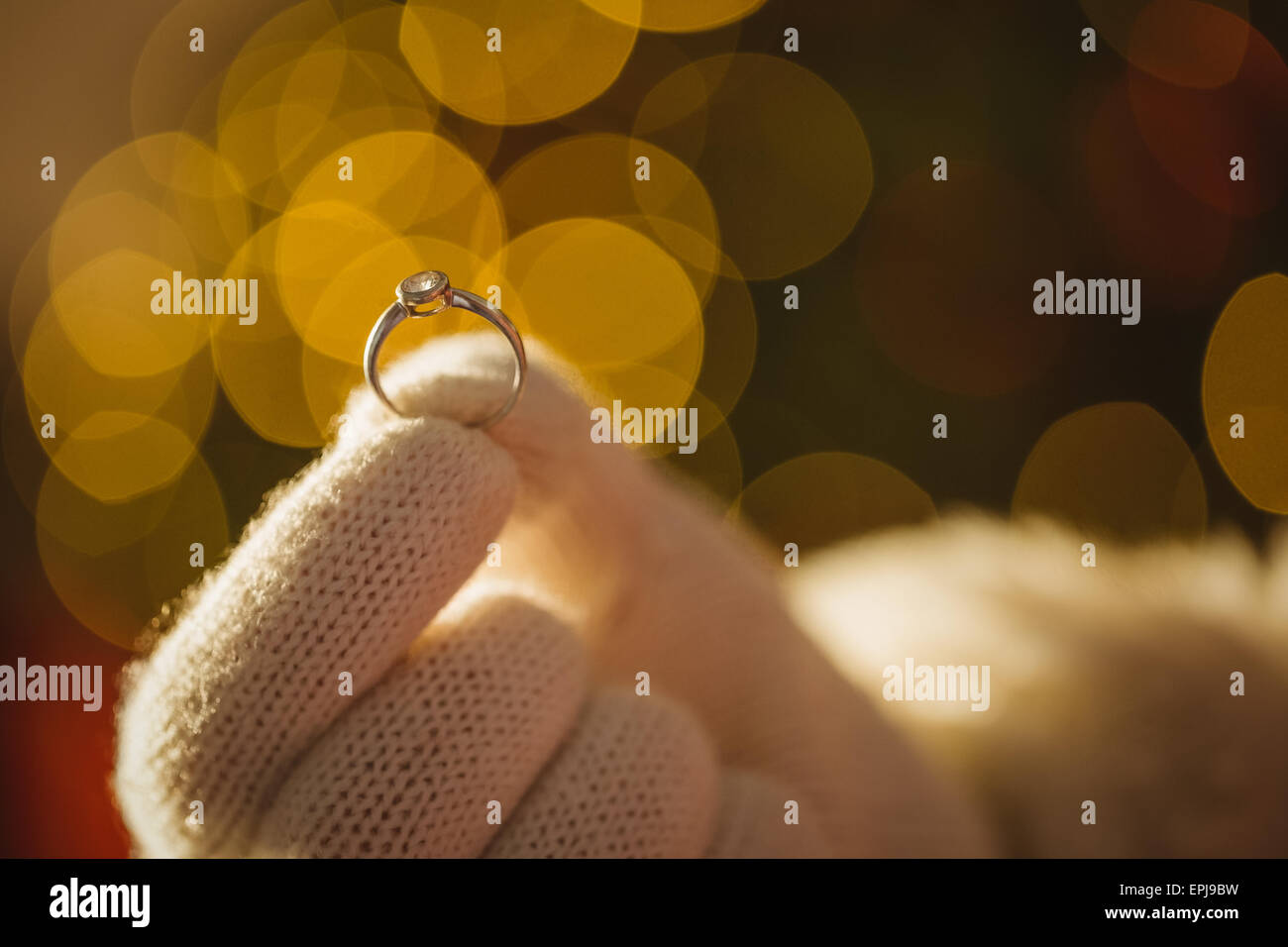 Santa claus holding engagement ring hi-res stock photography and images ...