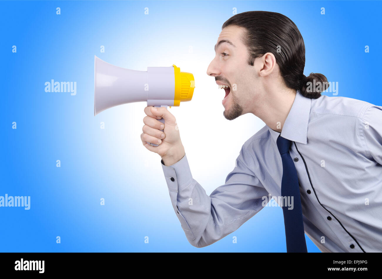 Man shouting and yelling with loudspeaker Stock Photo - Alamy