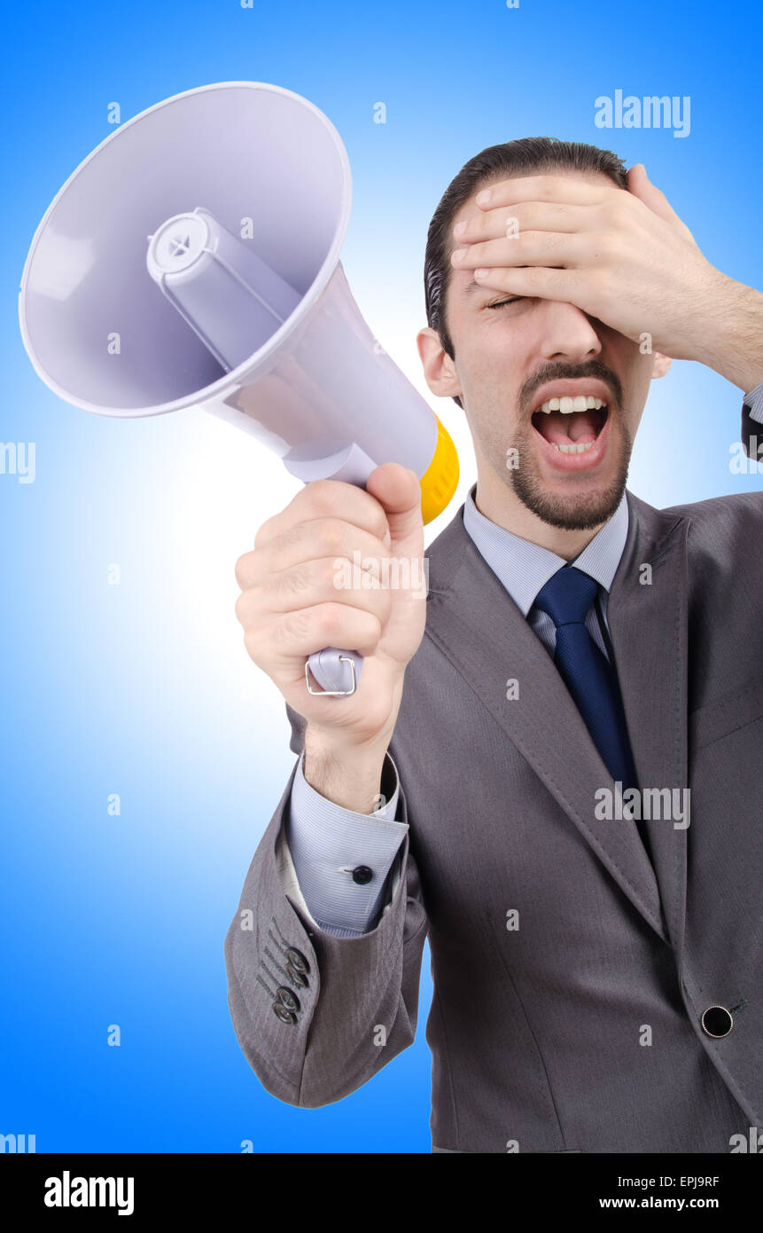 Man shouting and yelling with loudspeaker Stock Photo - Alamy