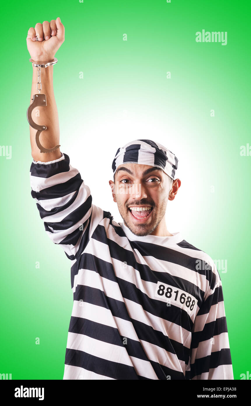 Convict criminal in striped uniform Stock Photo - Alamy