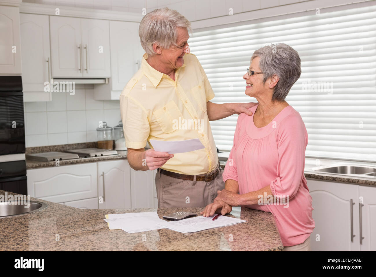 Senior couple paying their bills Stock Photo - Alamy