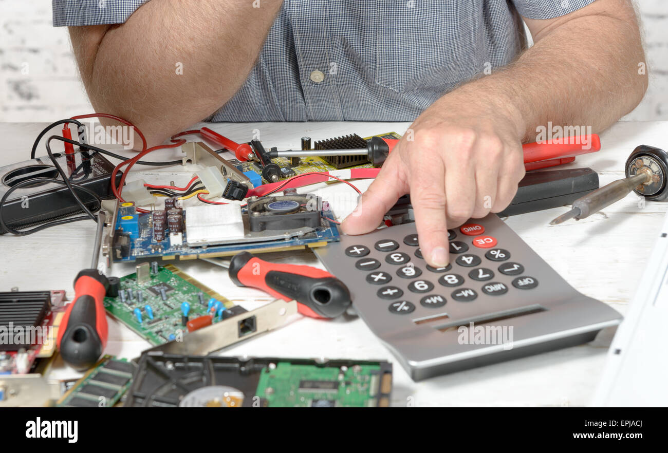 a technician repairing a computer Stock Photo - Alamy