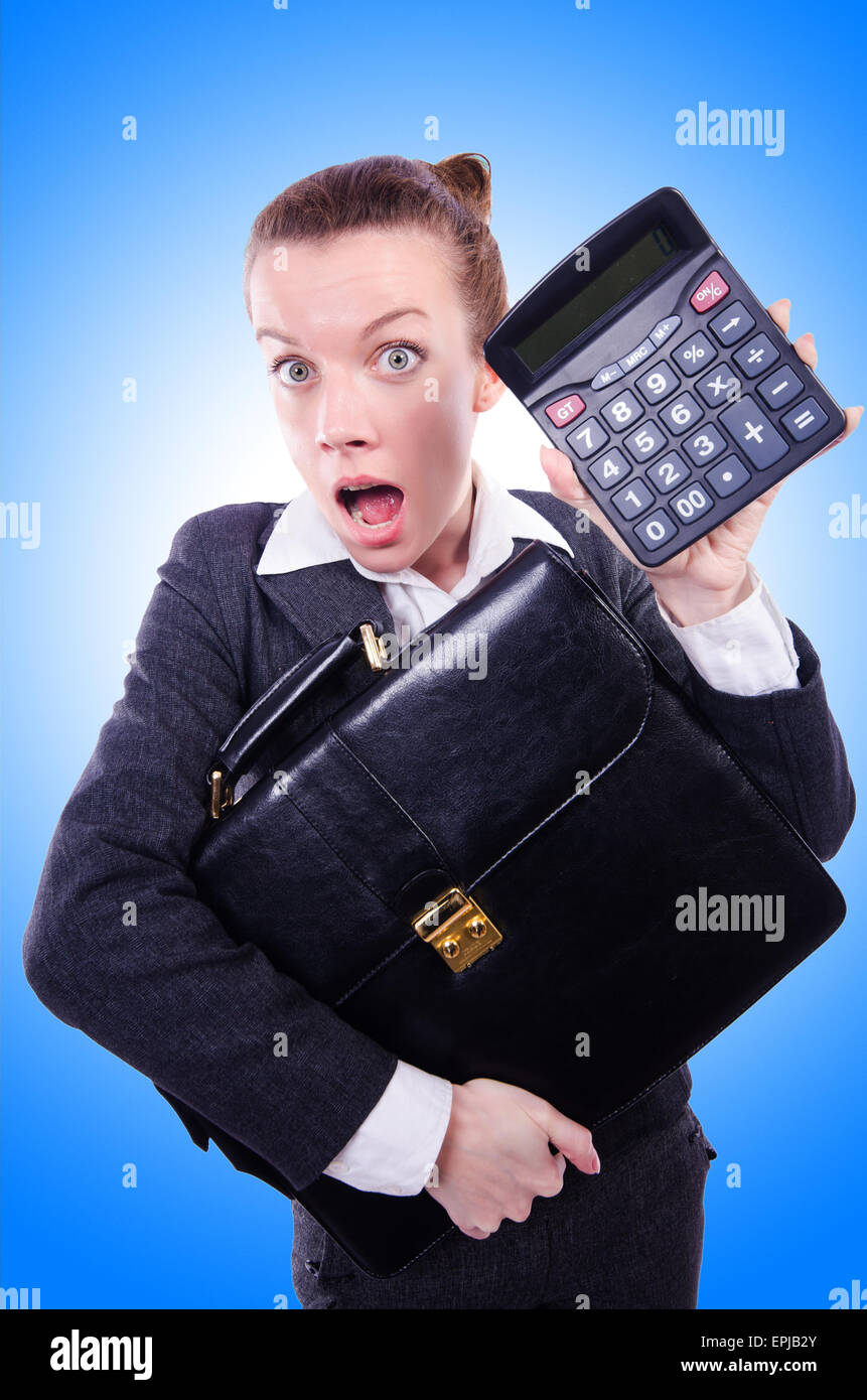 Nerd female accountant with calculator Stock Photo - Alamy