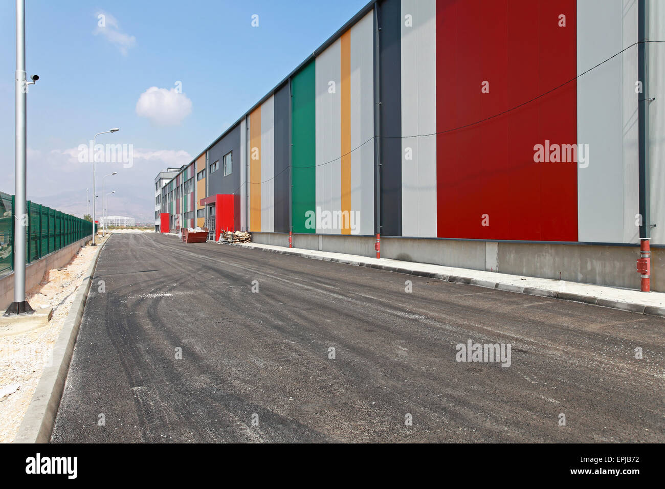 Warehouse access road Stock Photo - Alamy