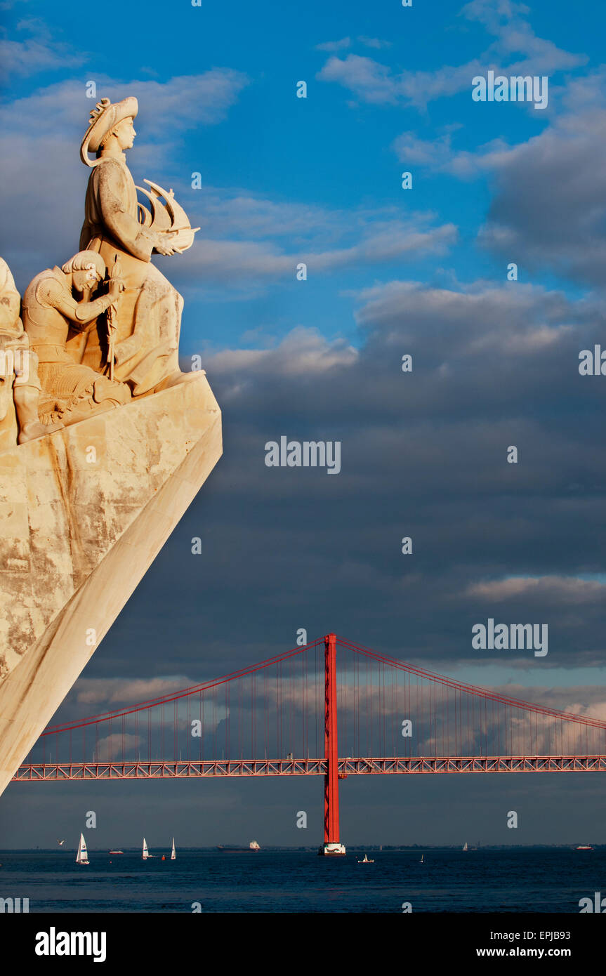 The Discoveries Monument at Belem with the 25th of April bridge in the ...