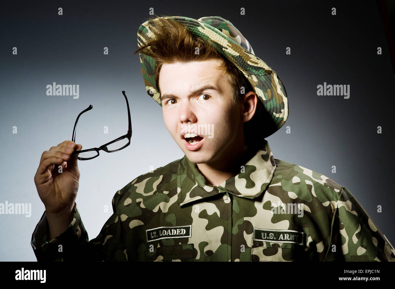 Funny soldier in military concept Stock Photo - Alamy
