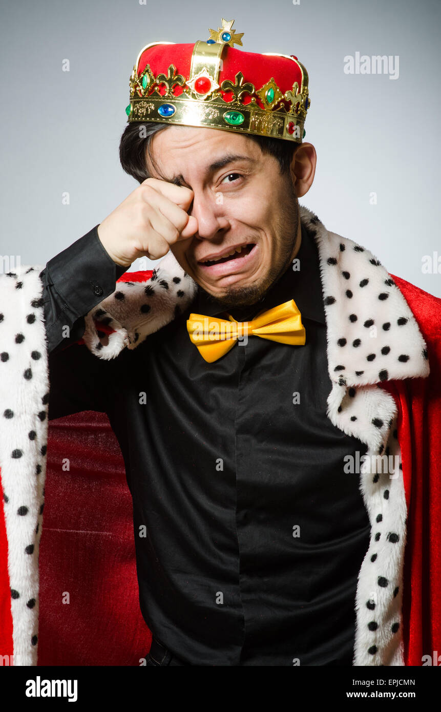Concept with funny man wearing crown Stock Photo - Alamy