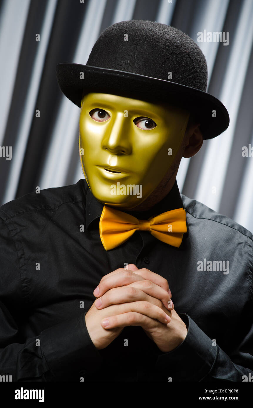 Funny concept with theatrical mask Stock Photo - Alamy