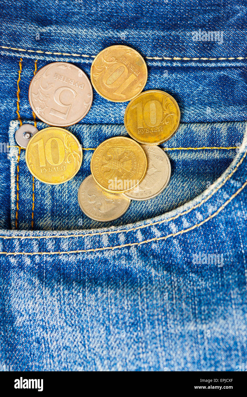 Coins and pocket jeans Stock Photo - Alamy