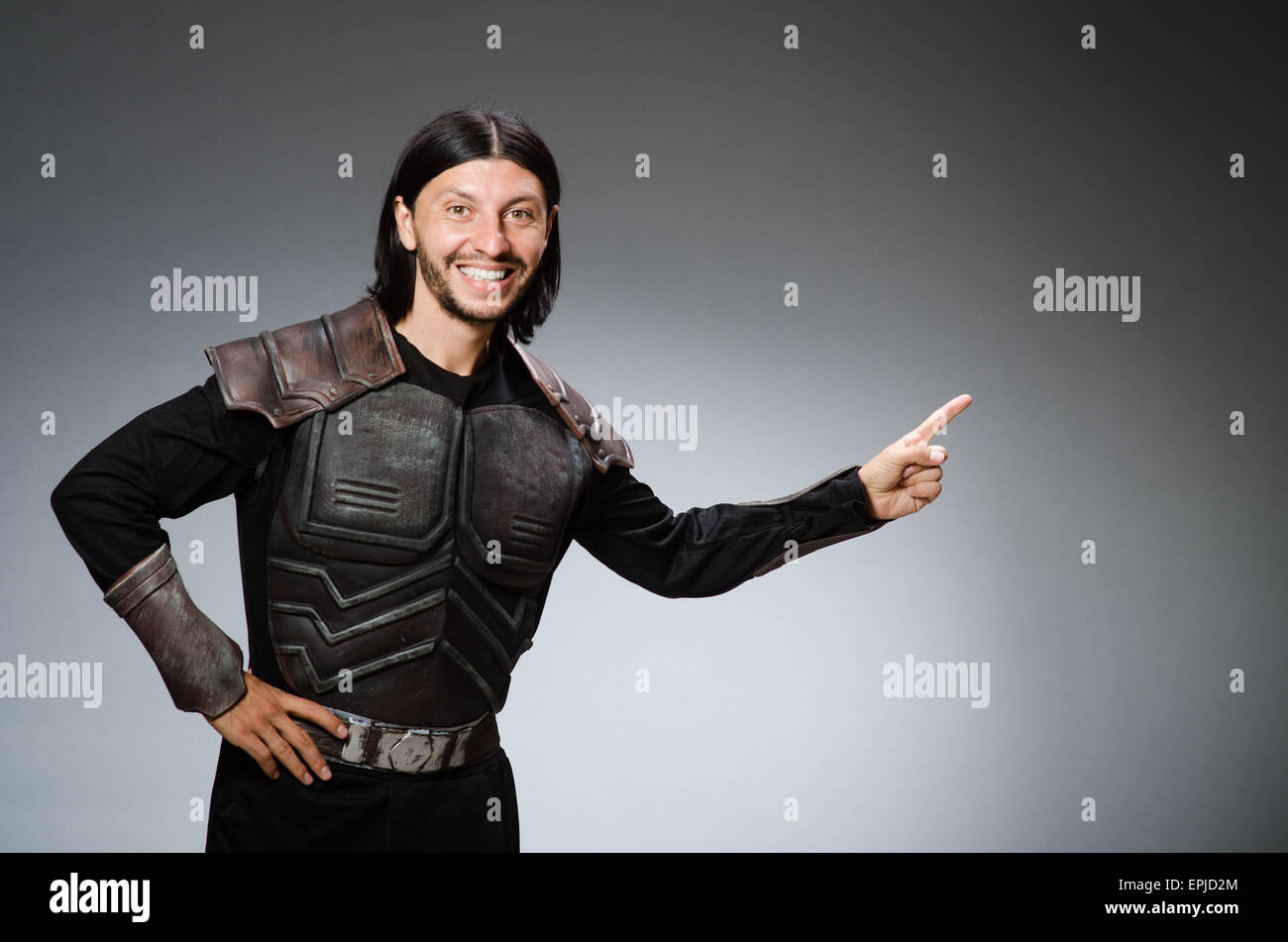 Funny knight against dark background Stock Photo - Alamy