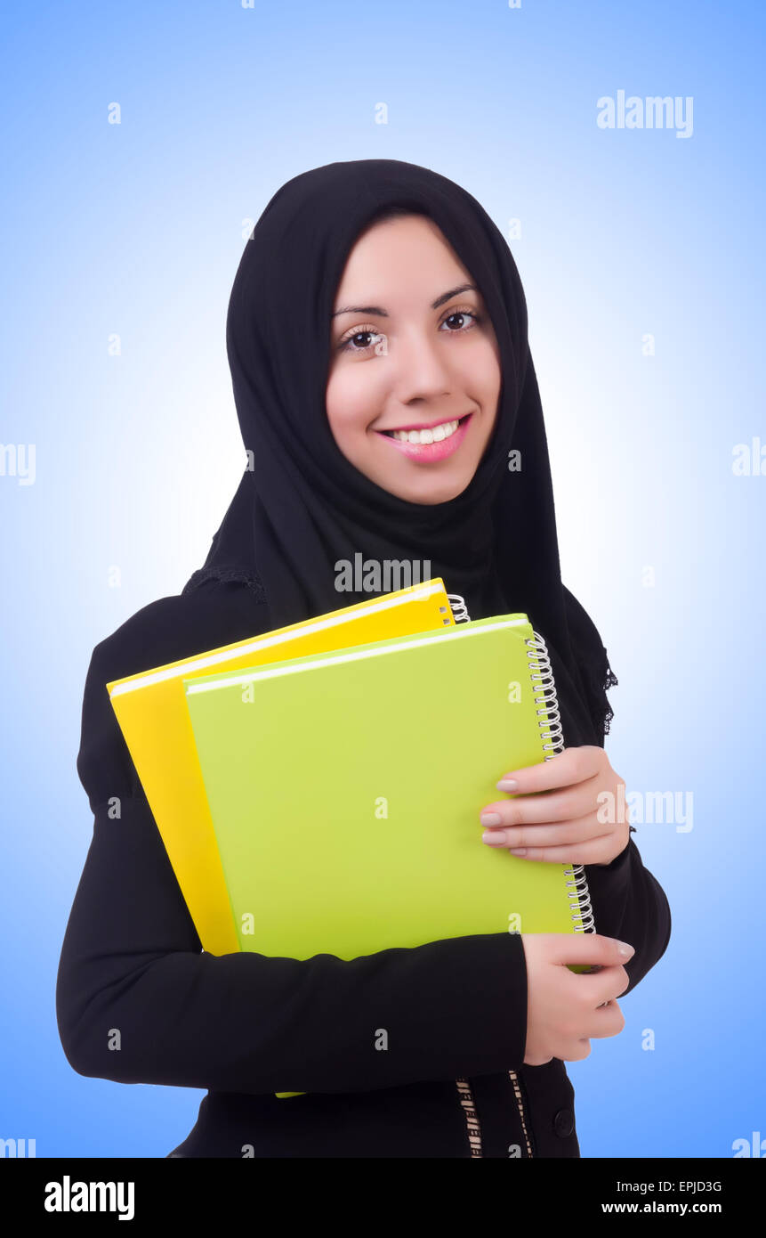 Young muslim female student with books Stock Photo - Alamy