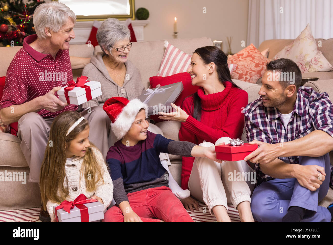 Multi generation family exchanging hi-res stock photography and images ...