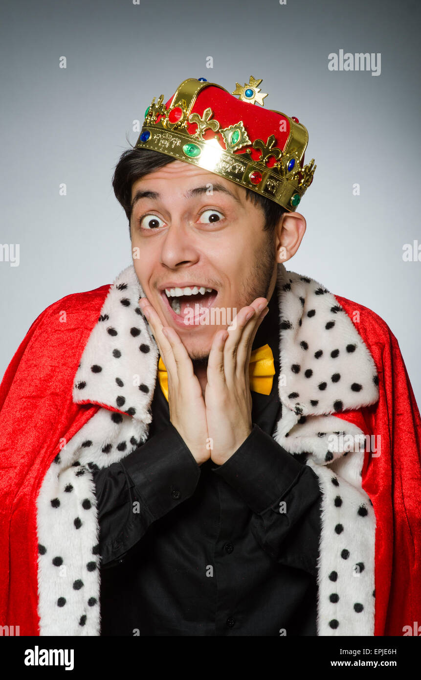 Concept with funny man wearing crown Stock Photo - Alamy