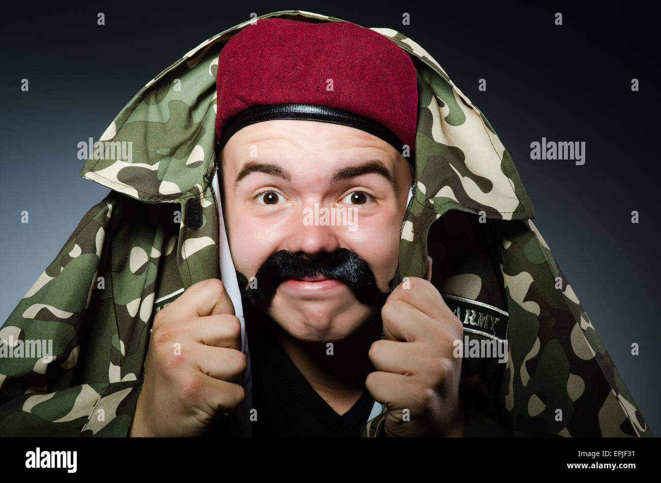 Funny soldier in military concept Stock Photo - Alamy