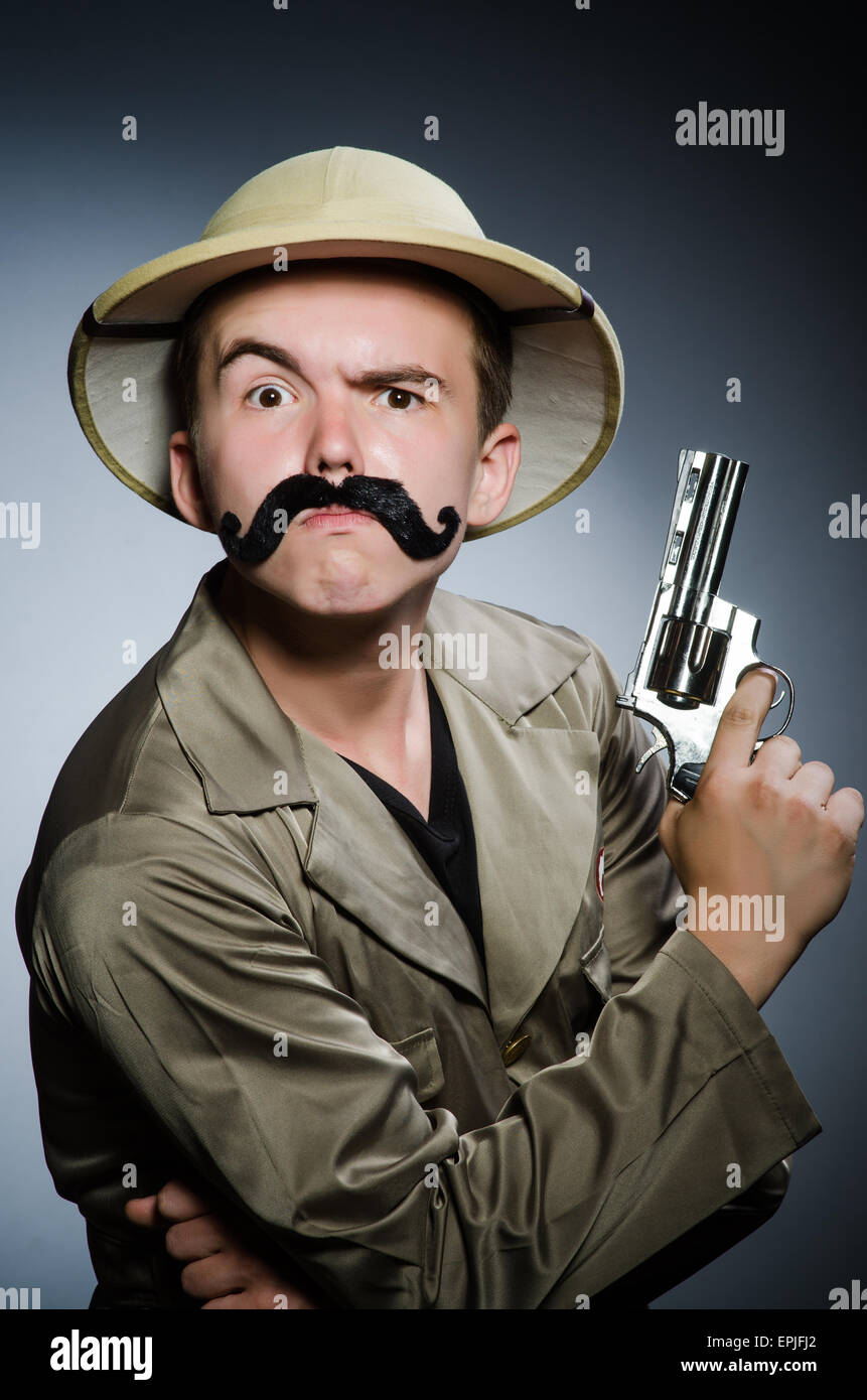 Man in safari hat in hunting concept Stock Photo - Alamy
