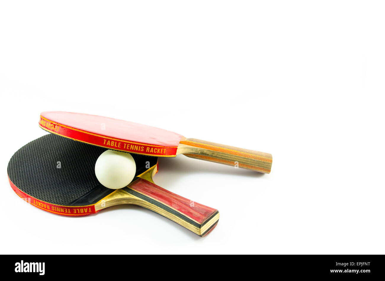 Two ping-pong rackets and a ball isolated on white Stock Photo - Alamy
