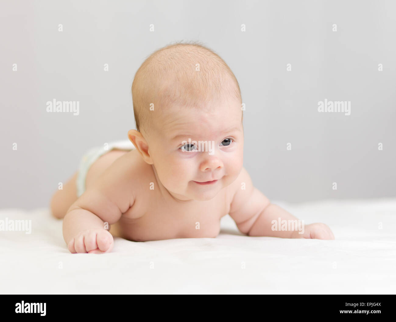 Little baby girl on table Stock Photo - Alamy