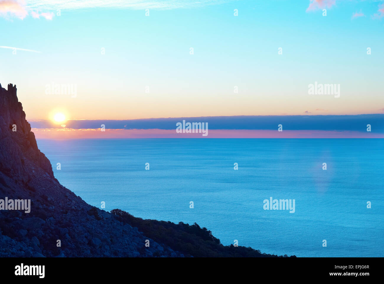 Beautiful sunset above sea mountain hi-res stock photography and images ...