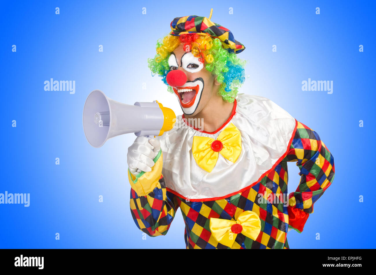 Clown with loudspeaker on white Stock Photo - Alamy
