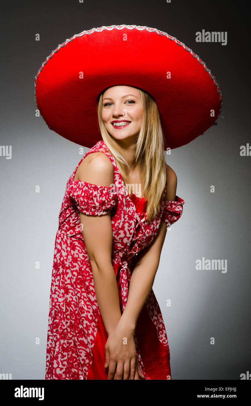 Woman wearing nice red sombrero Stock Photo - Alamy