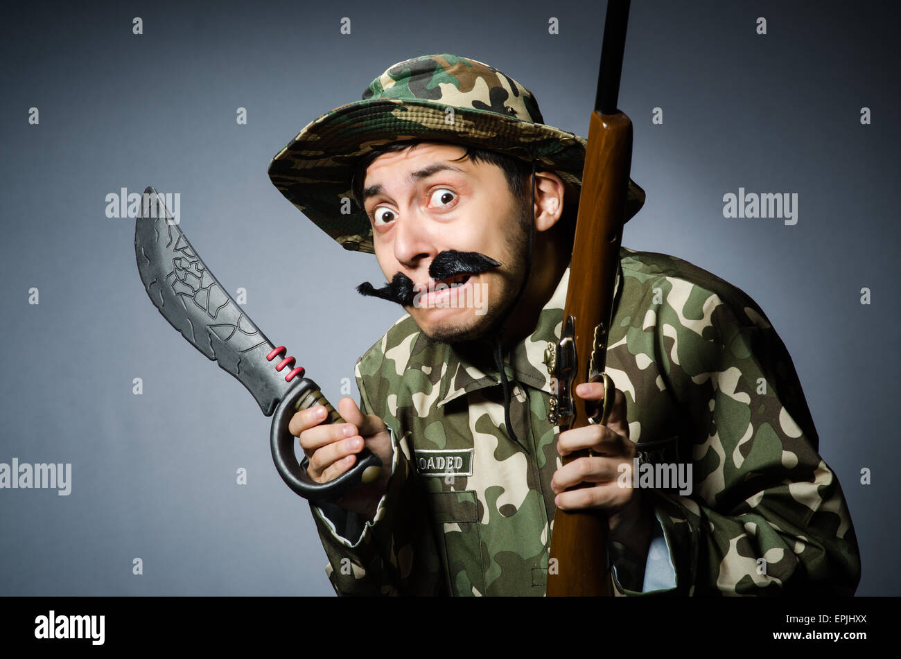 Funny soldier in military concept Stock Photo - Alamy