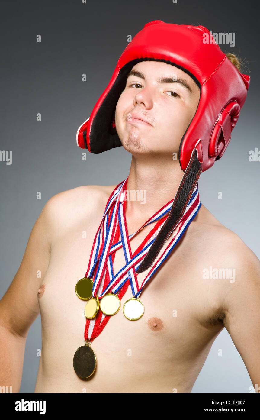 Funny boxer with winning gold medal Stock Photo - Alamy