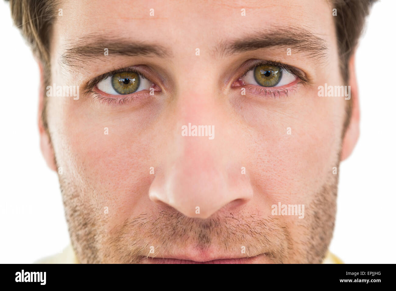Close up of unsmiling man Stock Photo - Alamy