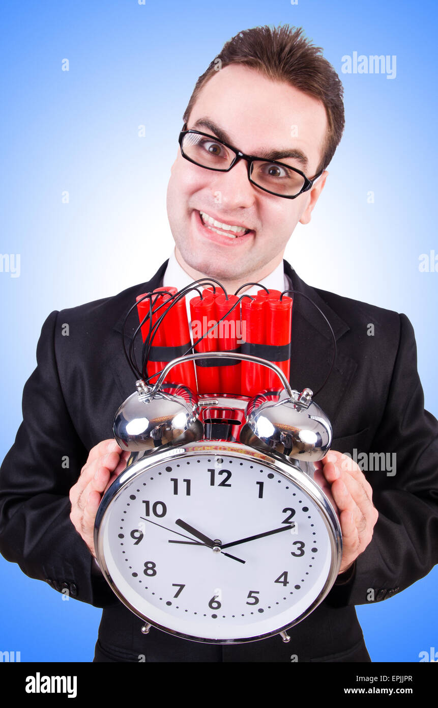 Man with time bomb isolated on white Stock Photo - Alamy
