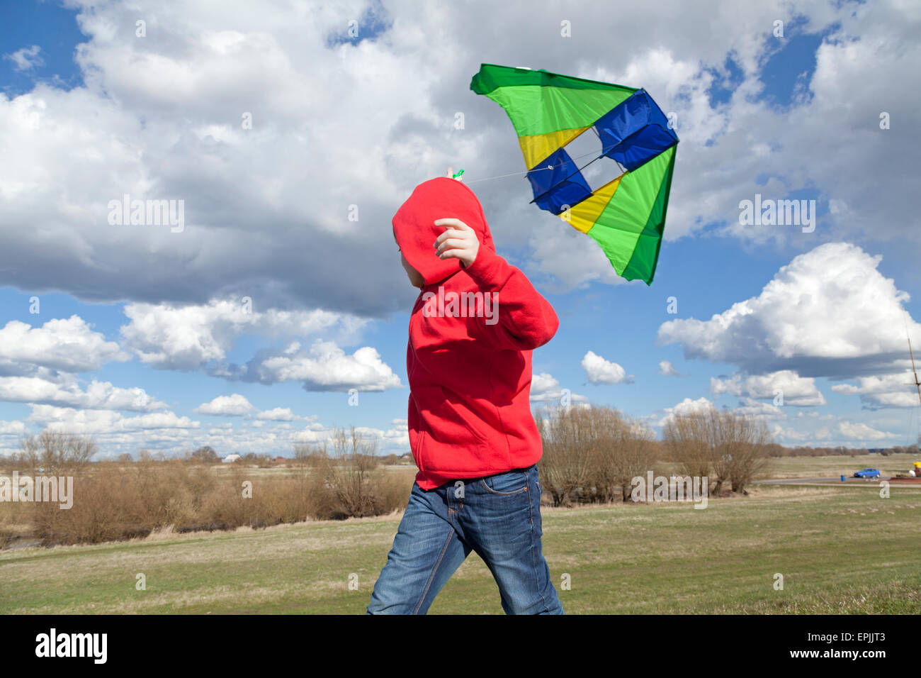 young boy flying a kite Stock Photo - Alamy