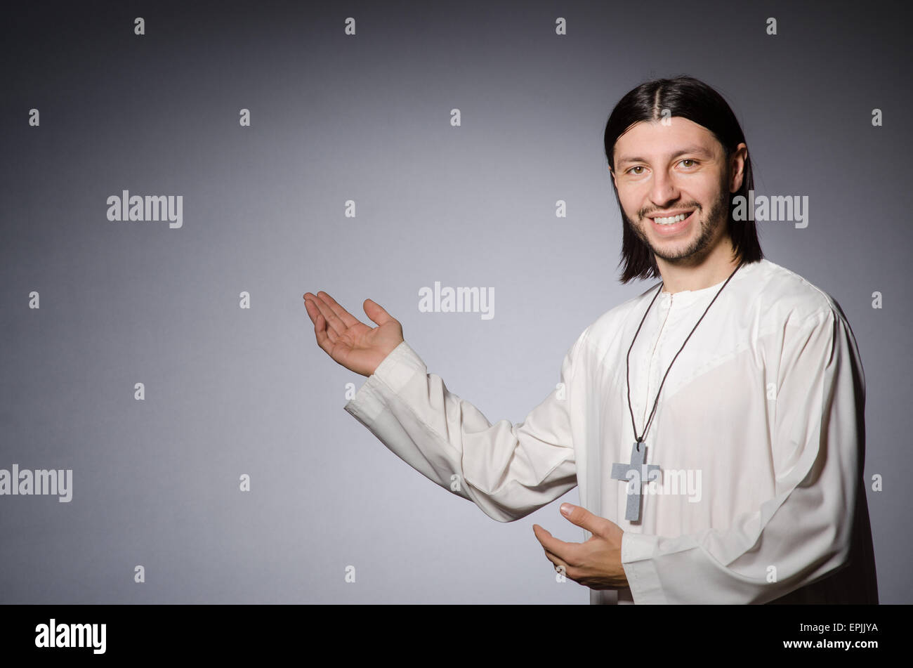 Priest man in religious concept Stock Photo - Alamy