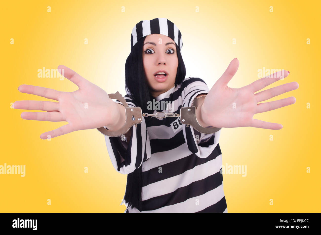 Prisoner in striped uniform on white Stock Photo - Alamy