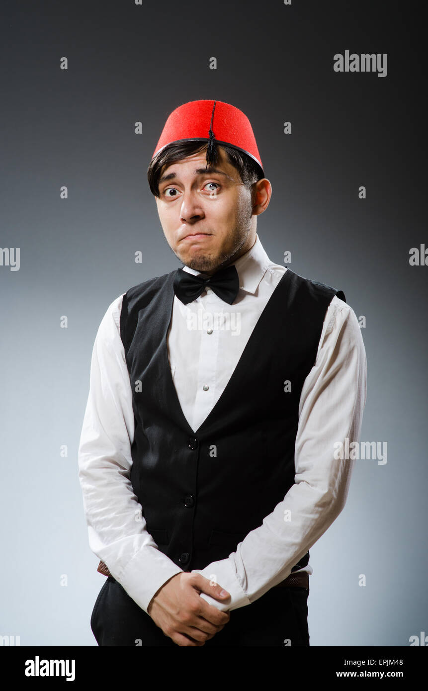 Man wearing traditional turkish hat fez Stock Photo - Alamy