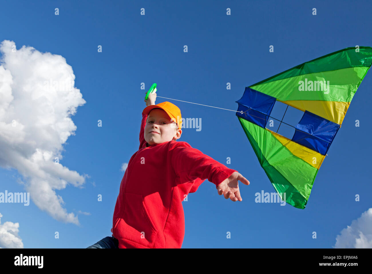 young boy flying a kite Stock Photo - Alamy
