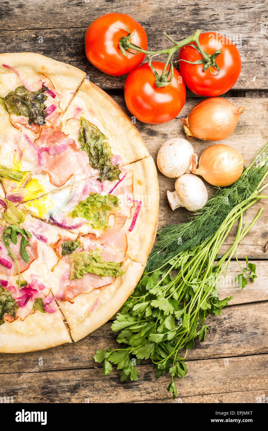 Pizza ingredients recipe and menu background. Top view image of half of ...