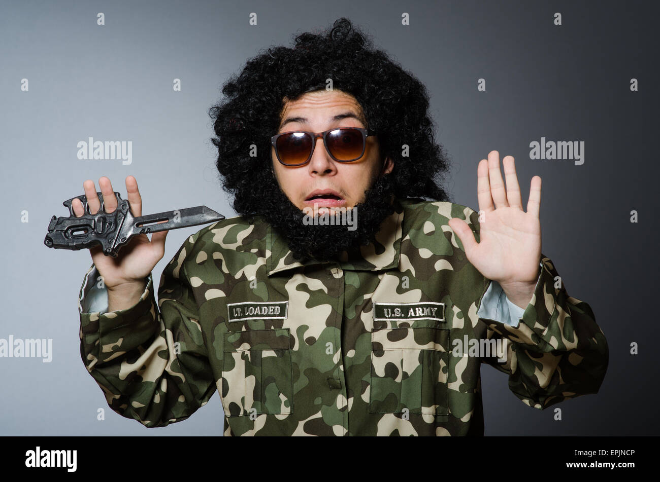 Funny soldier in military concept Stock Photo - Alamy