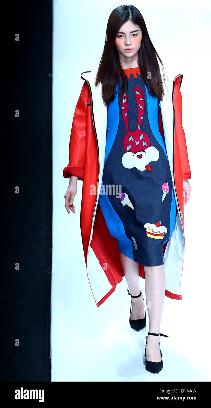 Beijing, China. 19th May, 2015. A model displays a creation of graduate ...