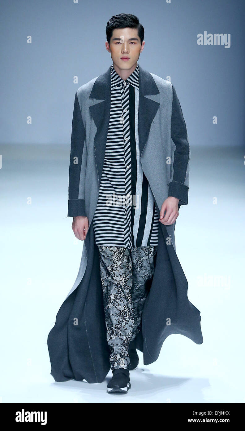 Beijing, China. 19th May, 2015. A model displays a creation of graduate ...
