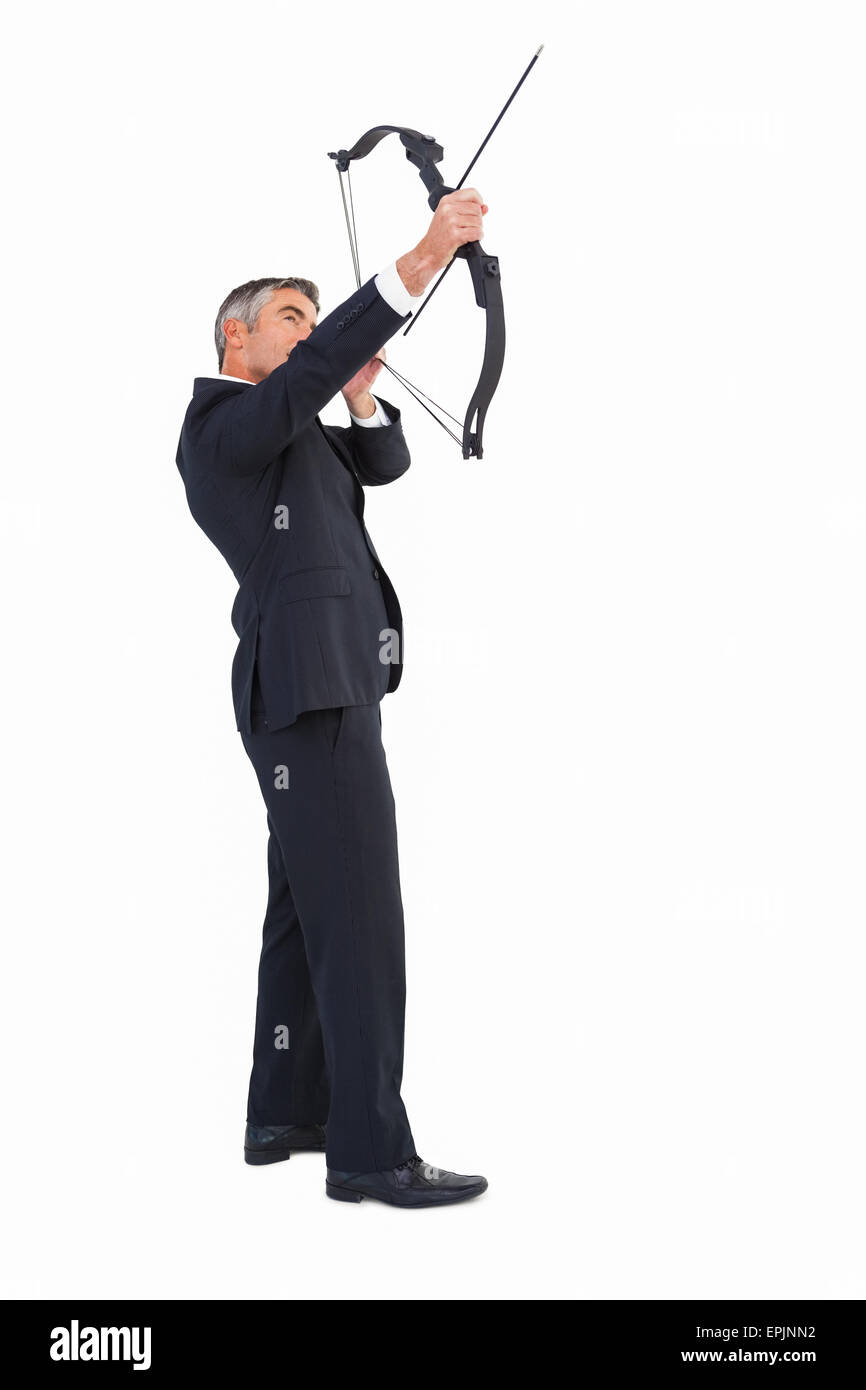 Elegant businessman stretching a bow Stock Photo - Alamy